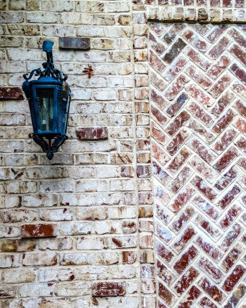 A white brick masterpiece captures old world charm - Pine Hall Brick